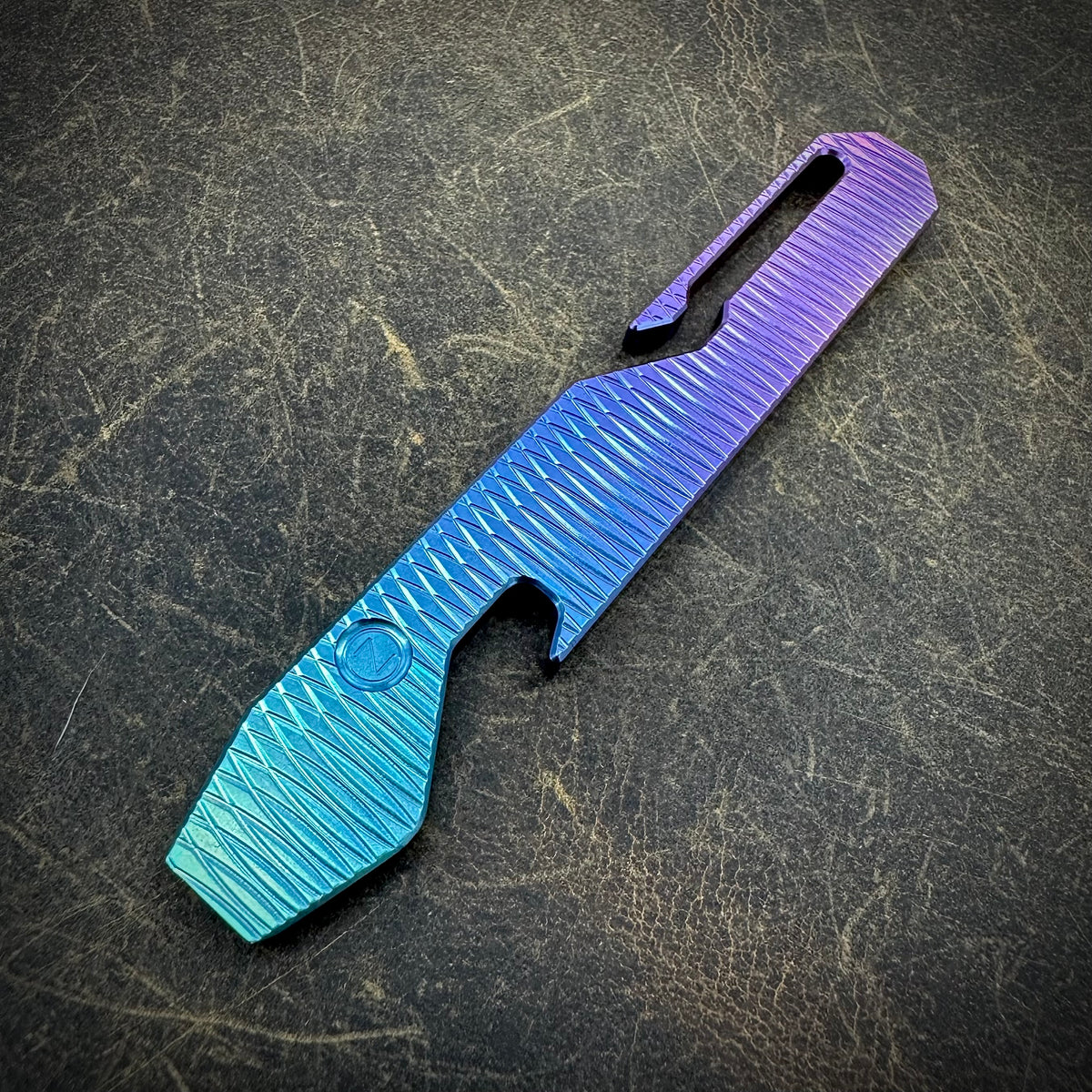 Teal to Blurple Fade Anodized OZ Pry. Radial Frag Milling on one side ...